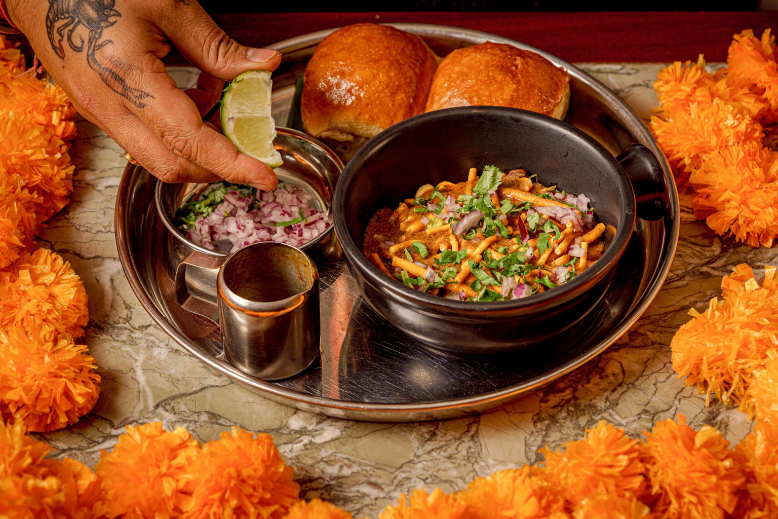 This Bombay-Inspired Indian Restaurant Famous For Its Bacon Naan Rolls ...